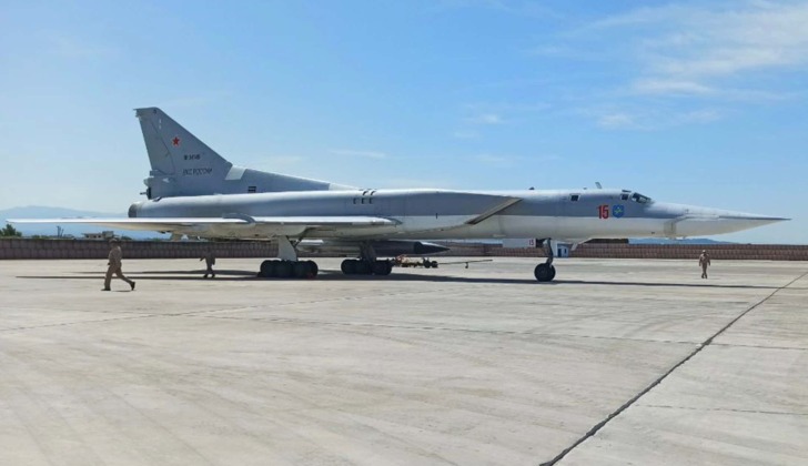 Russian Tu-22M3 Nuclear Capable Bombers and Su-35 Fighters Patrol ...